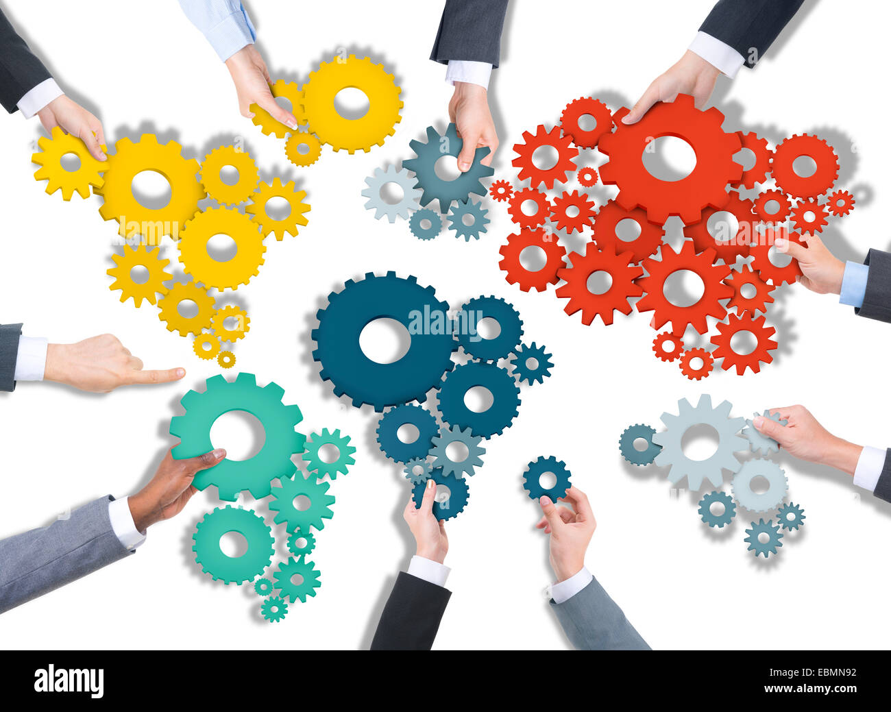 Group of Business People Holding Gears Stock Photo - Alamy