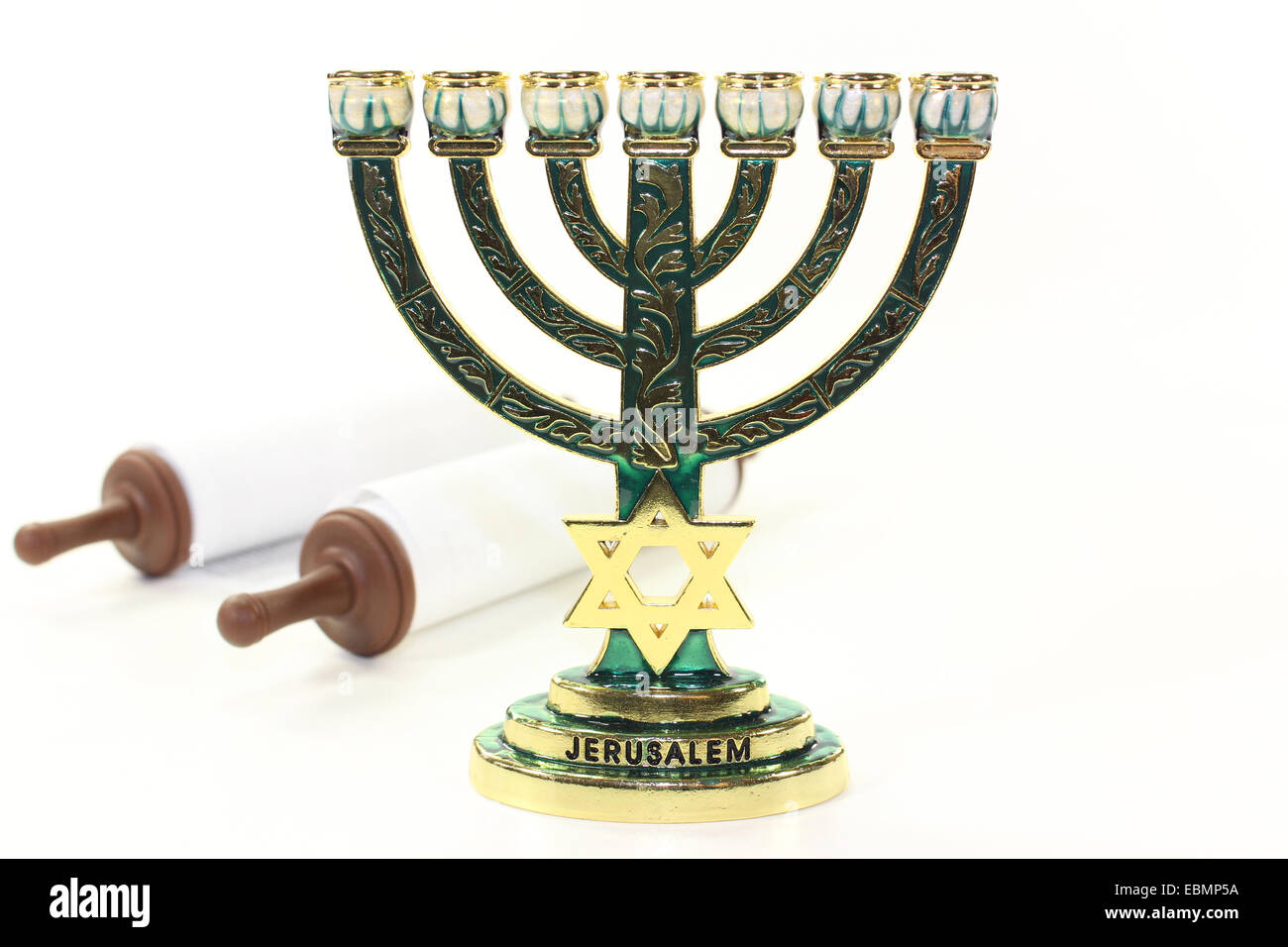 Jewish candlestick and Torah scroll in front of white background Stock ...