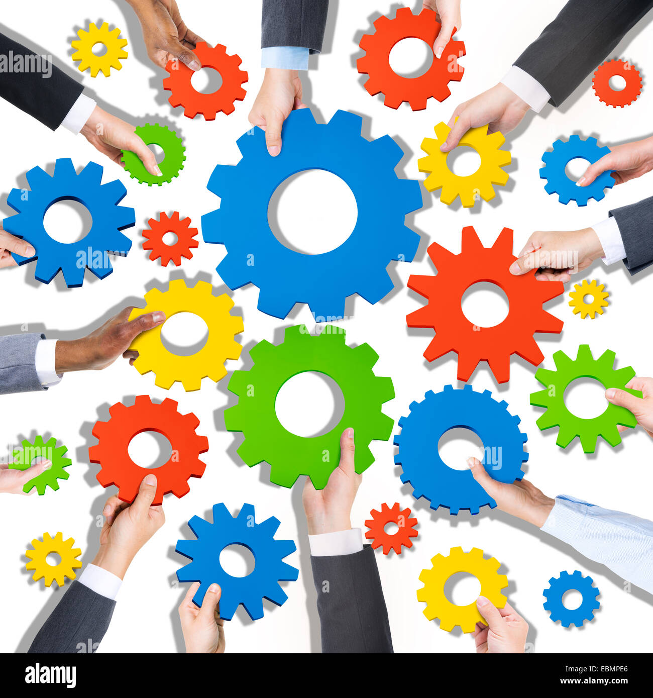 Aerial View of Business People Holding Gear Symbols Stock Photo - Alamy