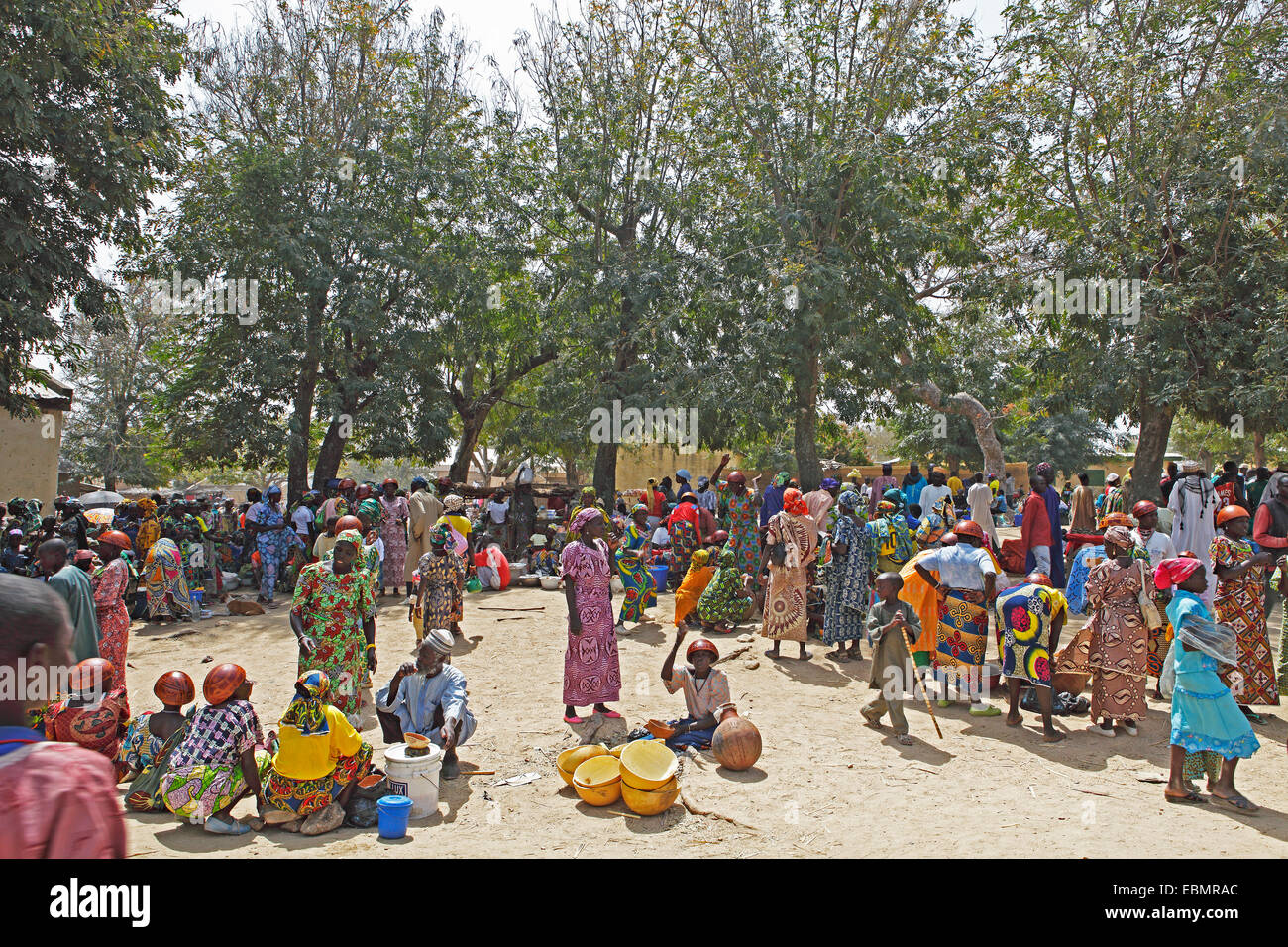 Market scene, women wearing typical calabash helmets and colourful ...