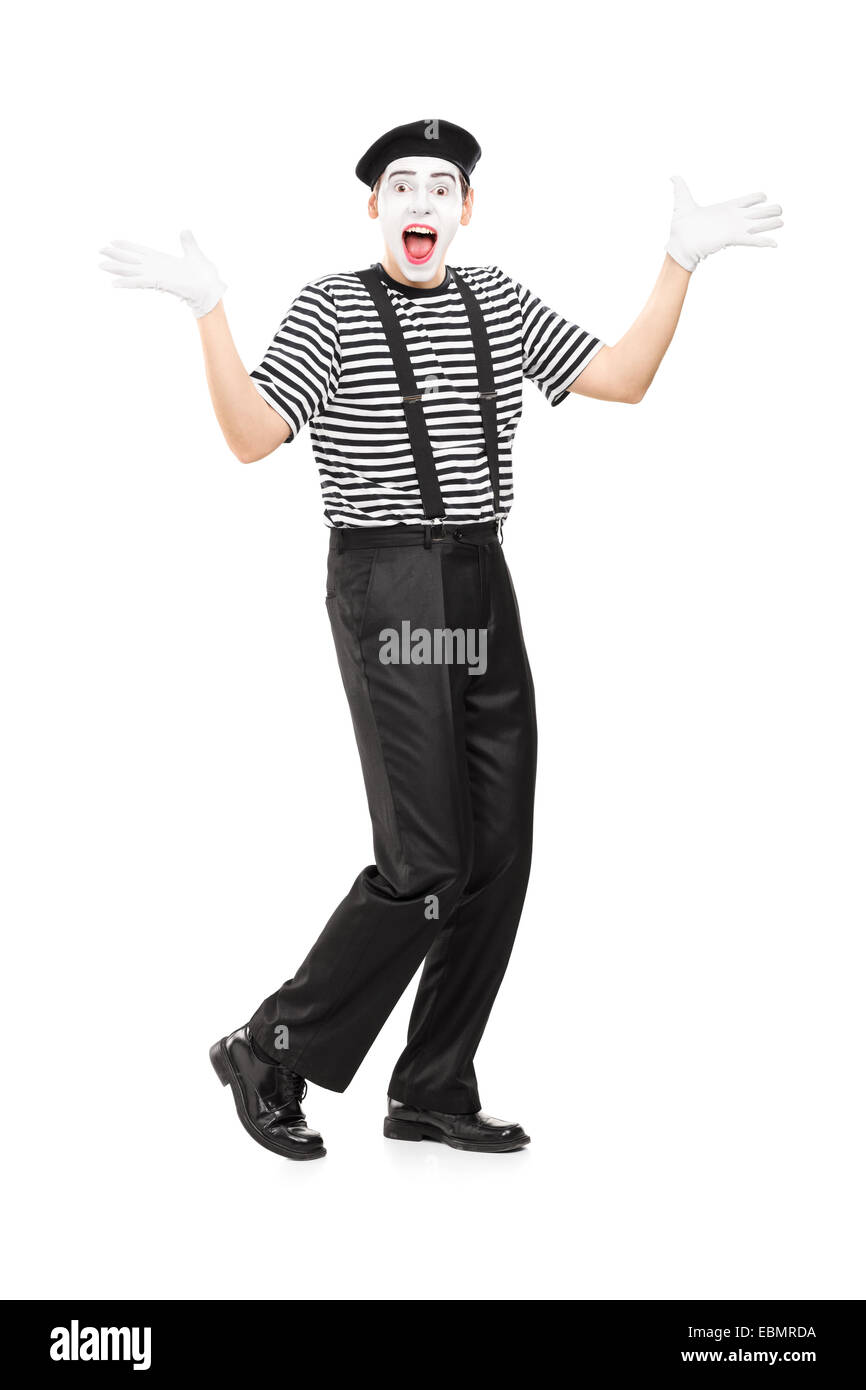 Full length portrait of a mime artist gesturing joy with his hands ...