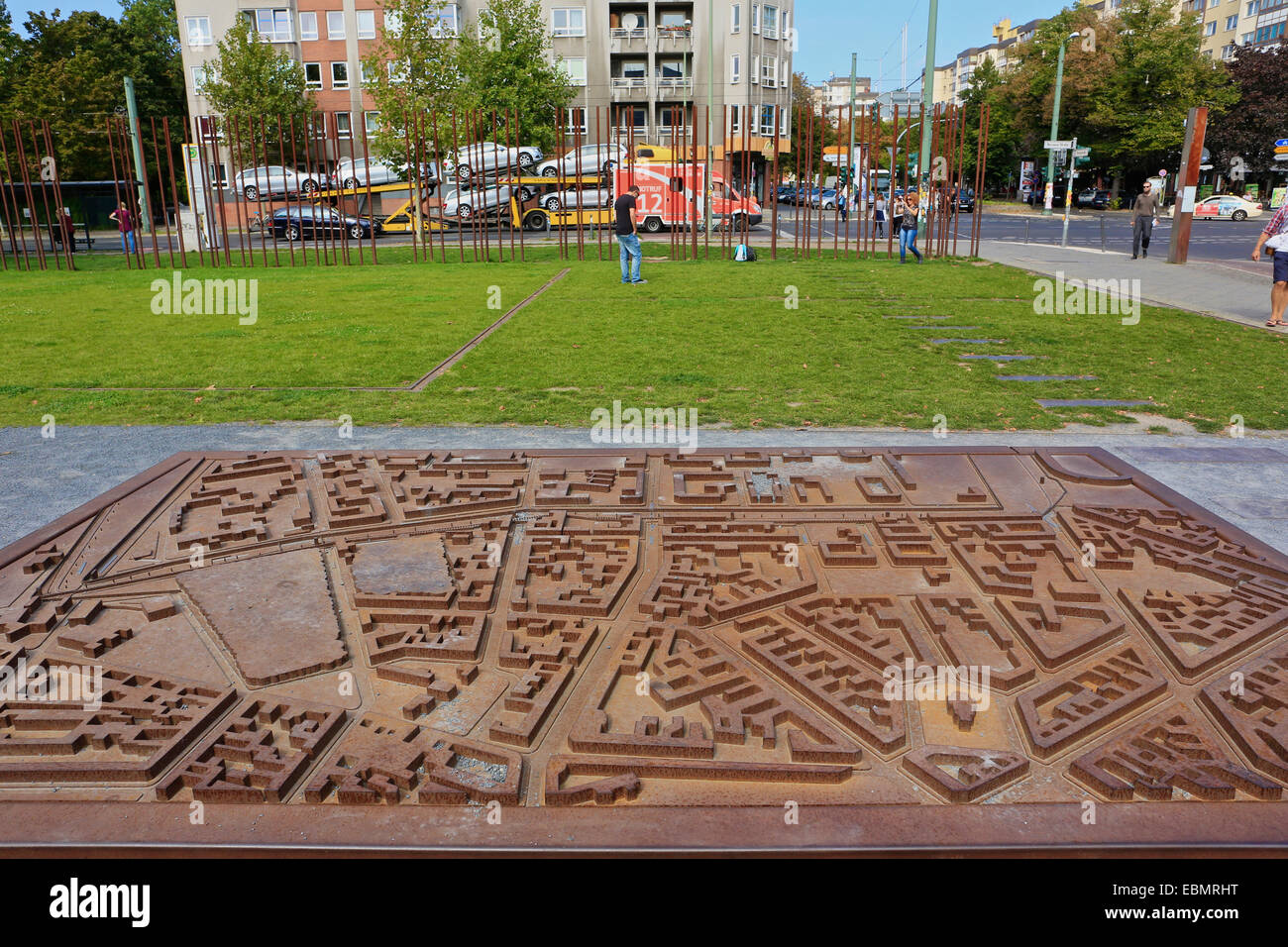 Site of the Berlin Wall Bernauer Str. Tourists look at model of the ...
