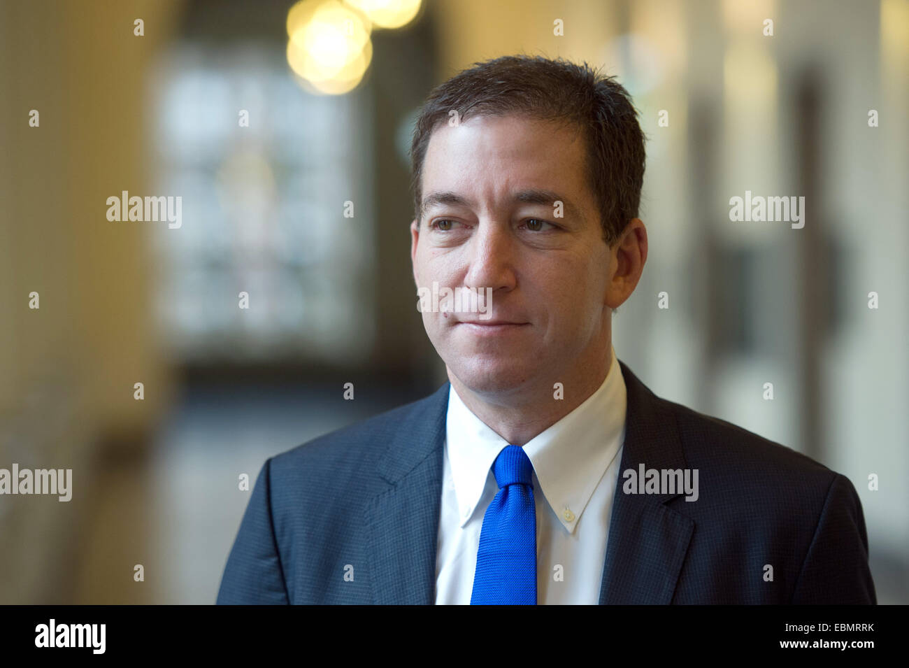 Munich, Germany. 1st Dec, 2014. The US journalist Glenn Greenwald waits ...