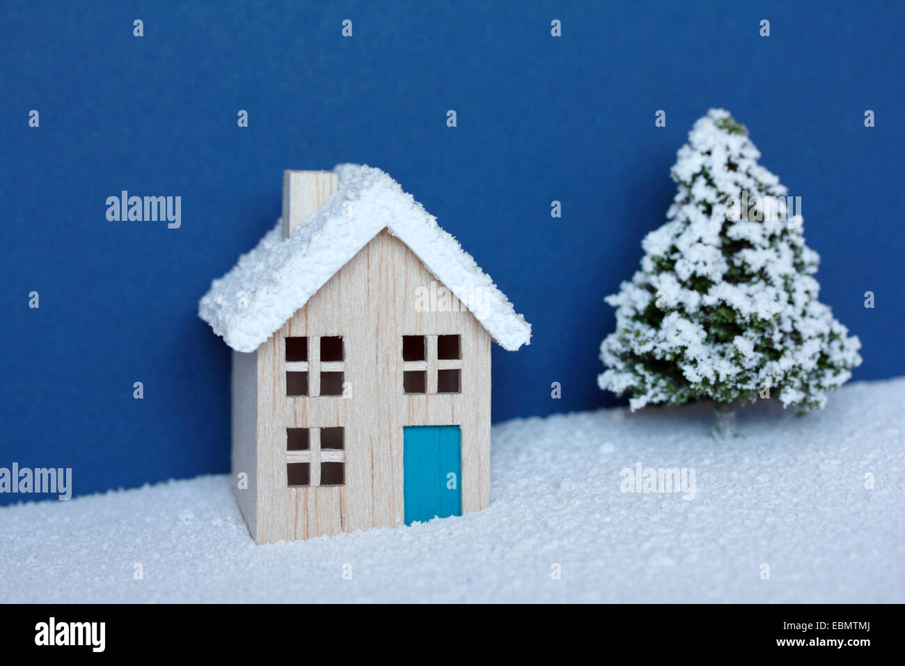 Model house in artificial snow Stock Photo - Alamy