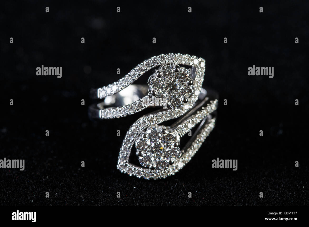 Jewellery ring on the black background Stock Photo - Alamy