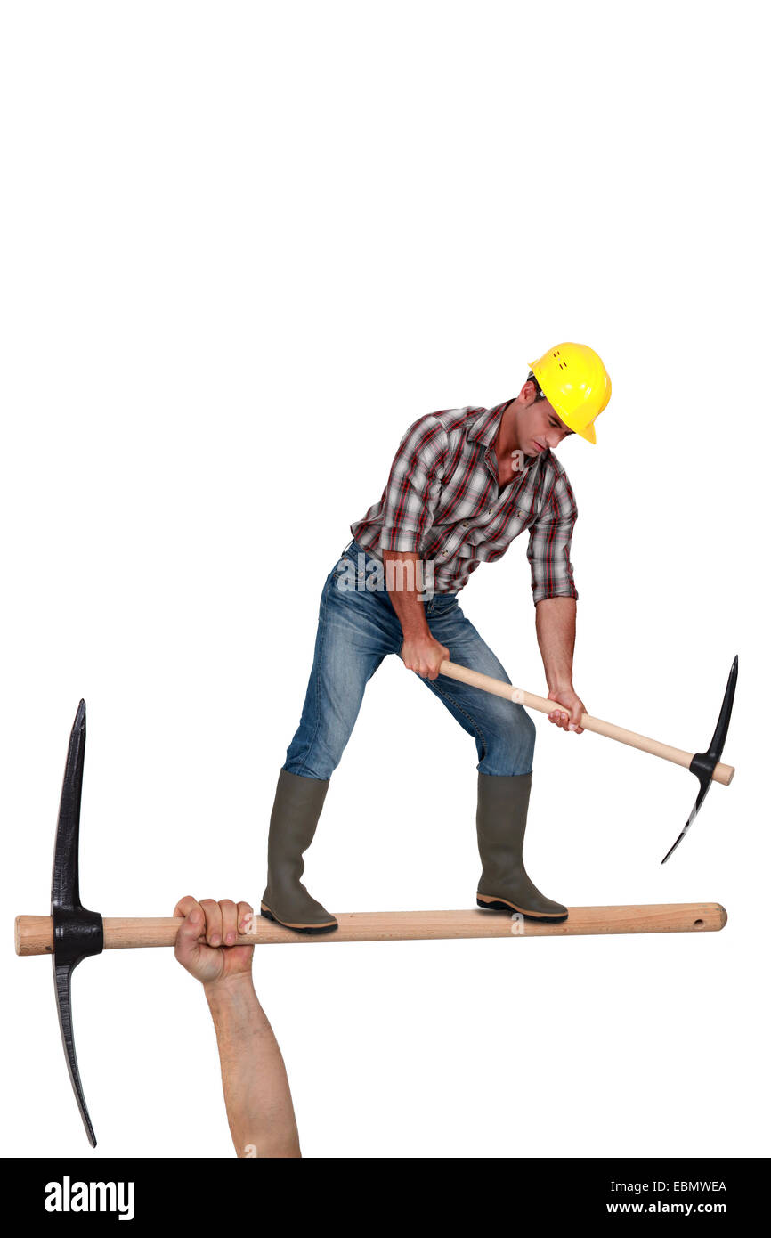 Strong muscular man using Cut Out Stock Images & Pictures - Alamy