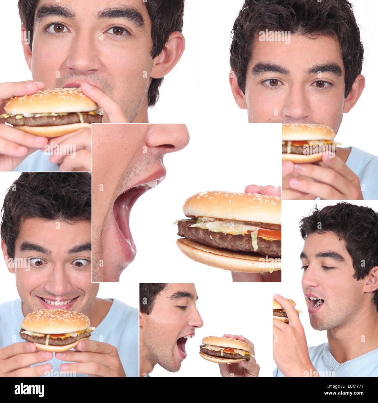 Young man eating a burger Stock Photo - Alamy