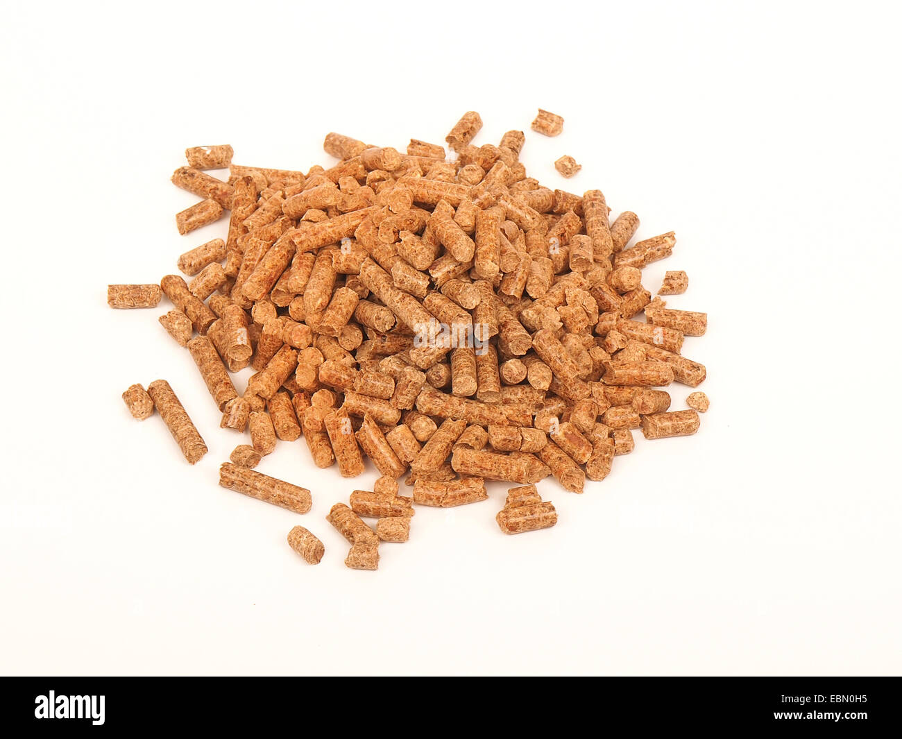 closeup image of wood pellets on white background Stock Photo - Alamy