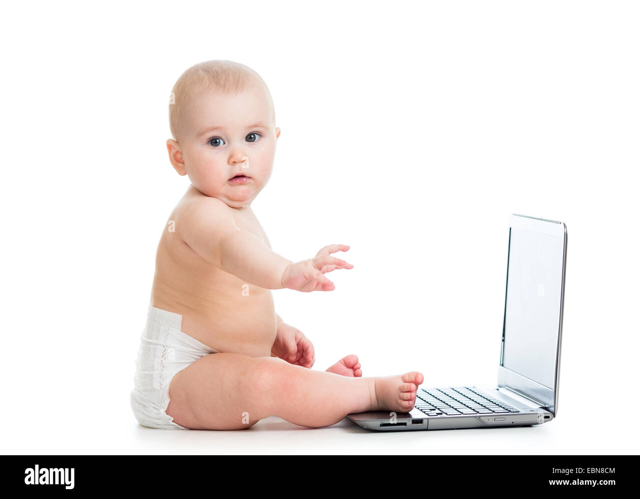 little baby is working on laptop Stock Photo - Alamy