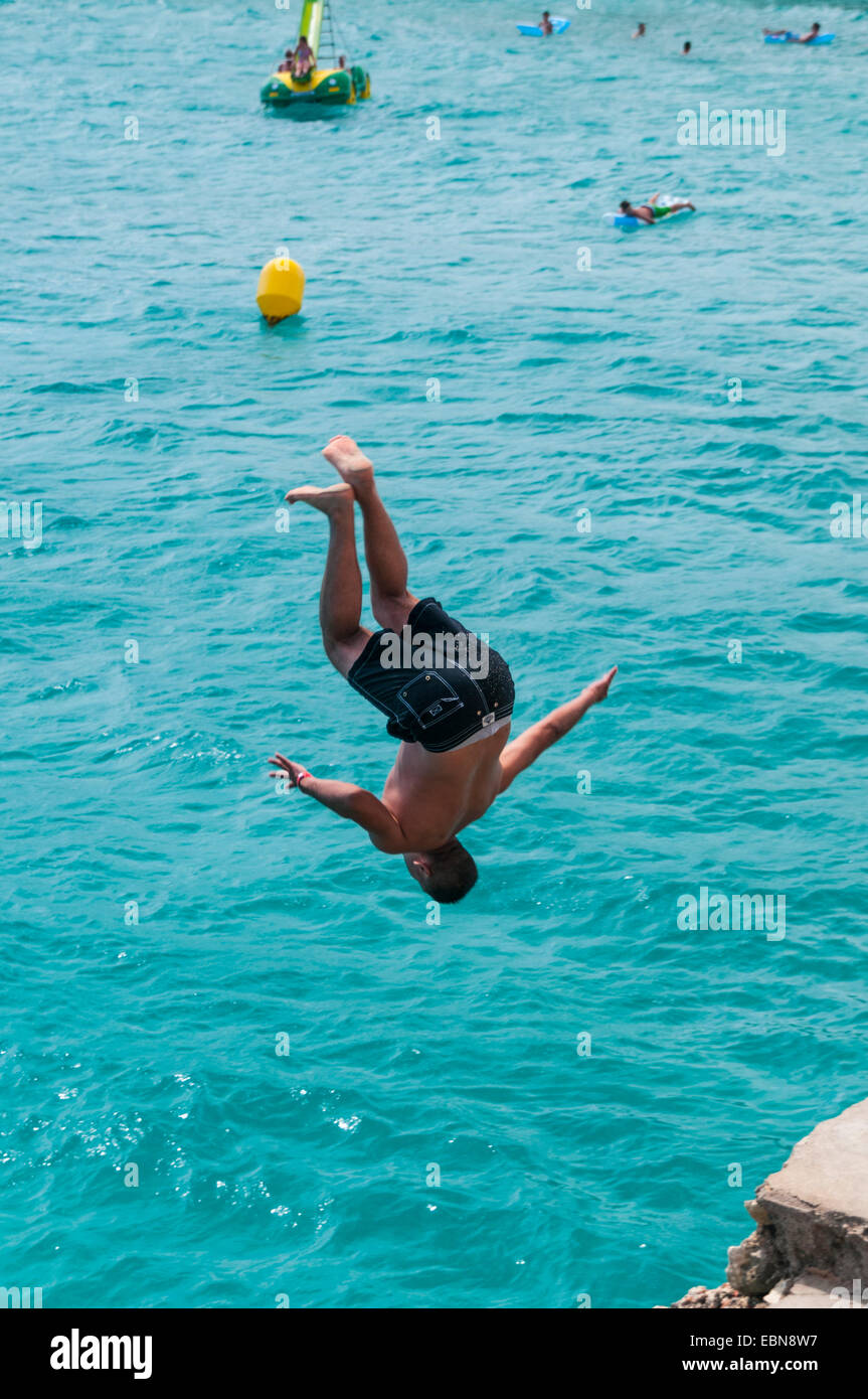 Person somersaulting hi-res stock photography and images - Alamy