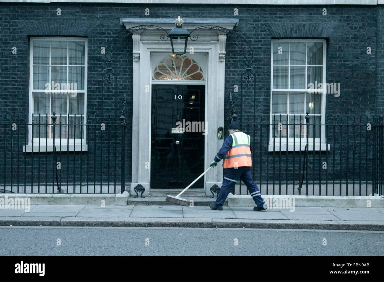 Street cleaner sweeps up leaves hi-res stock photography and images - Alamy