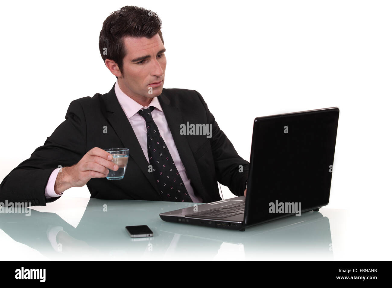 Office worker drinking water Stock Photo - Alamy