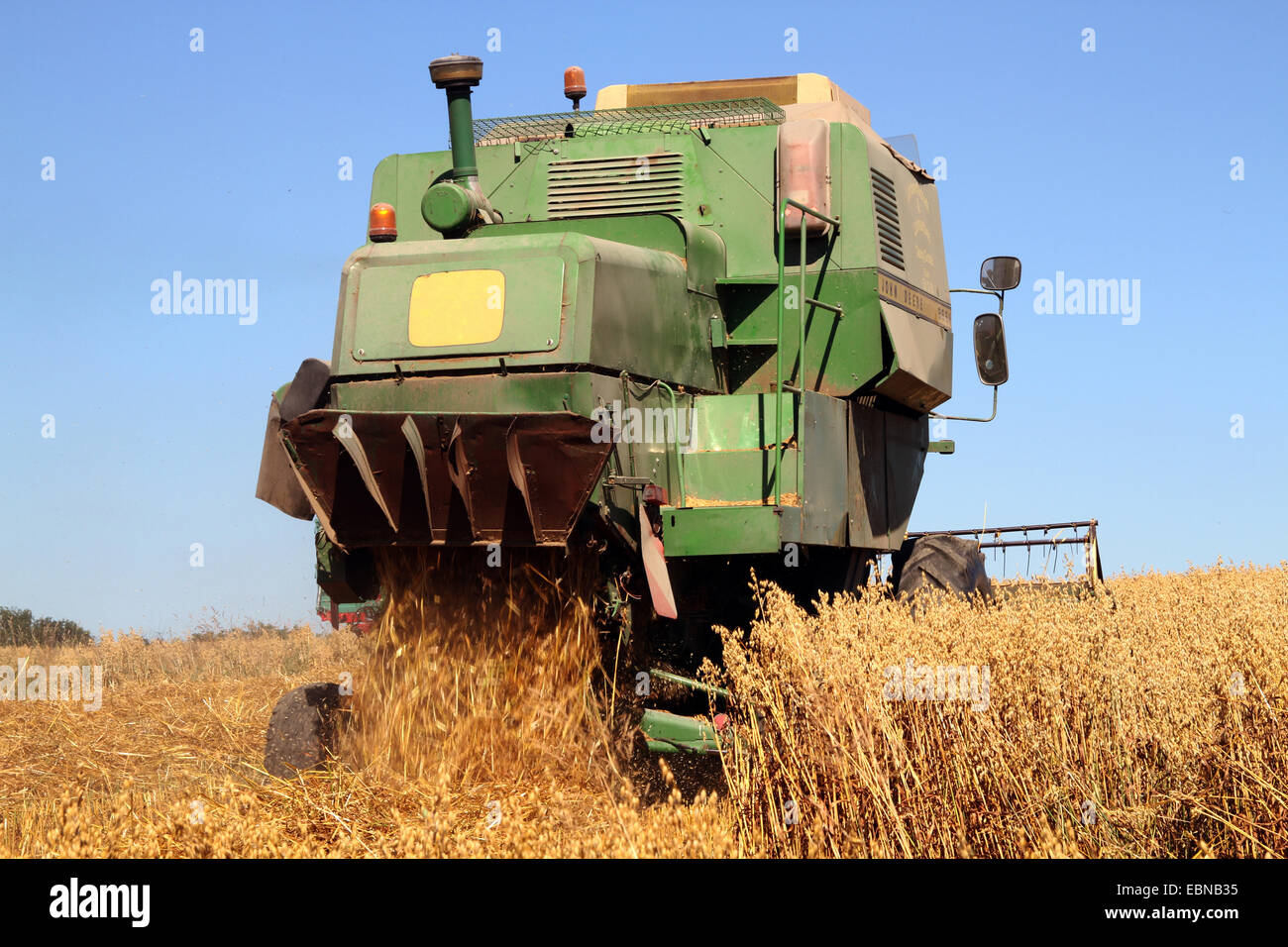 Harvester works on agricultural hi-res stock photography and images - Alamy