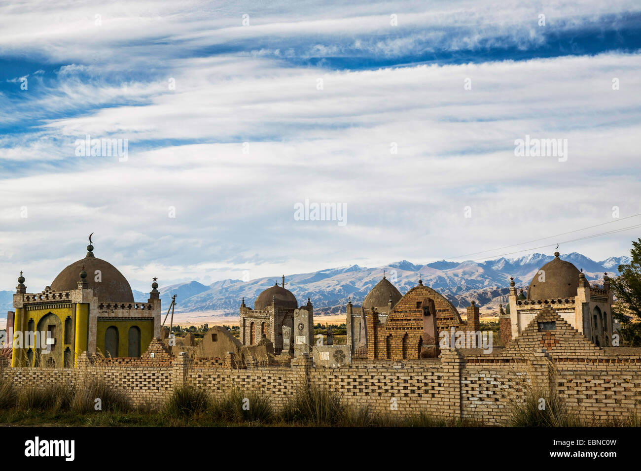 traditional graves made of clay bricks on Islamic cemetery, Kyrgyzstan ...