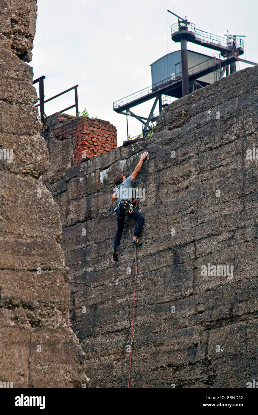 climbing at a cladding of former industrial facility, Germany, North ...