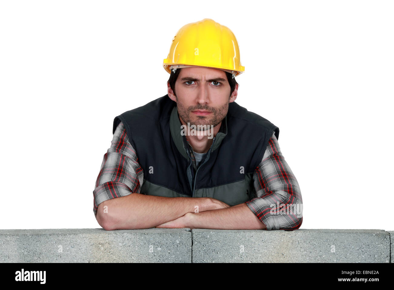 A mason angrily staring Stock Photo - Alamy