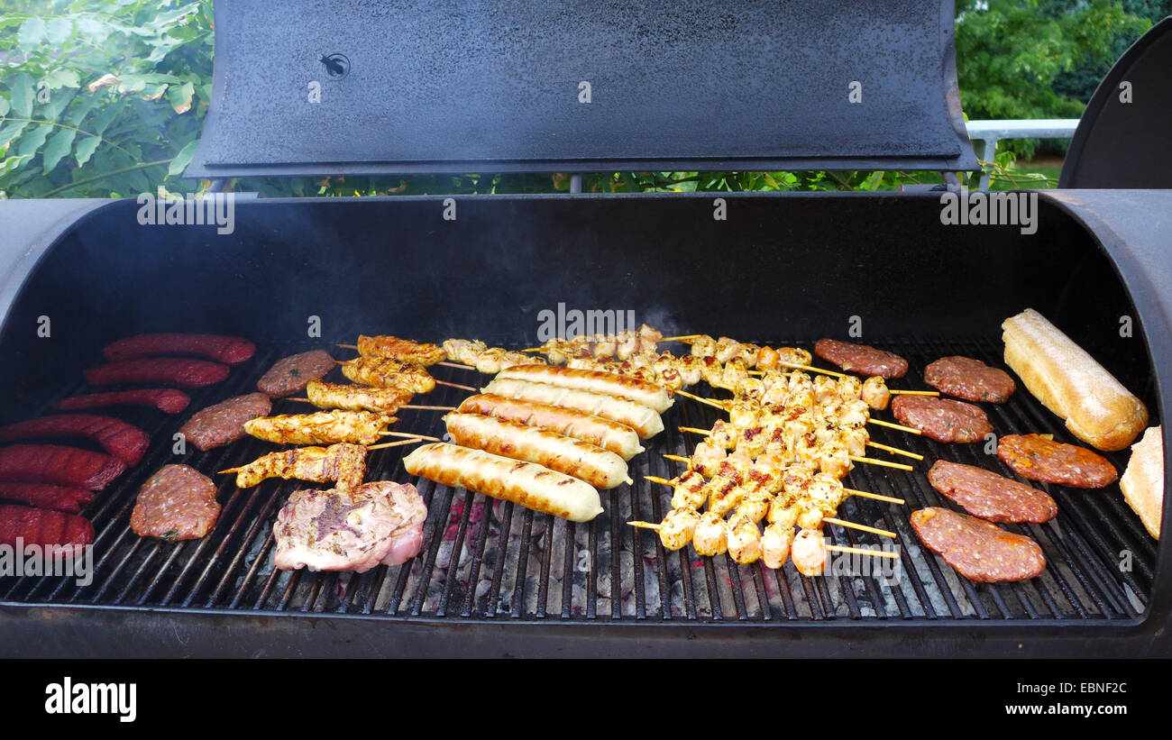 grill meat in a Barbecue-Smoker Stock Photo - Alamy