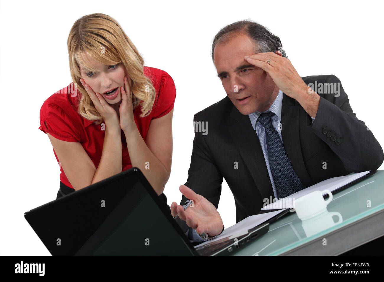 Businessman and woman facing a problem Stock Photo - Alamy