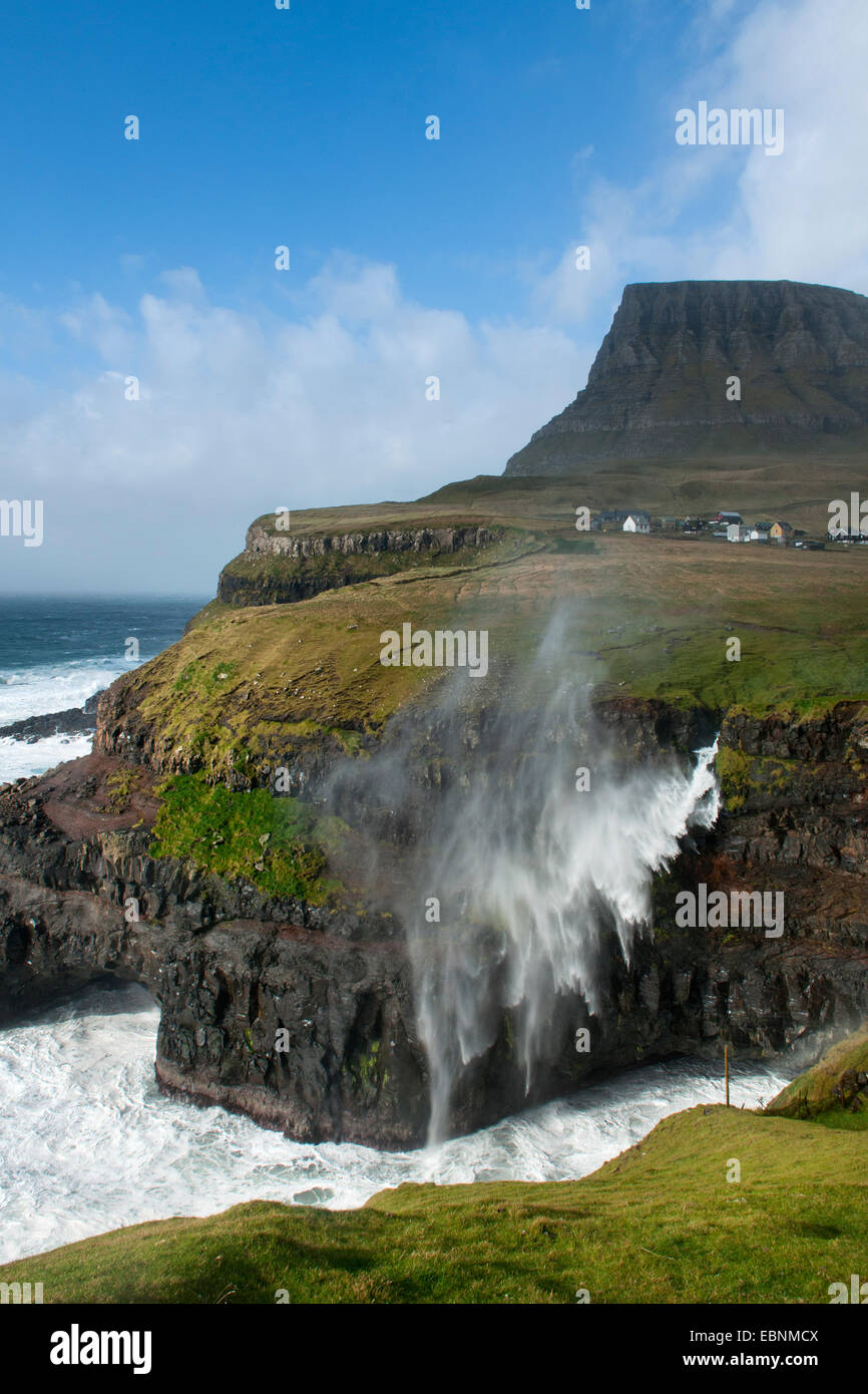 Mulafossur waterfall in a windy day, Gasadalur Village, Vagar Islands ...