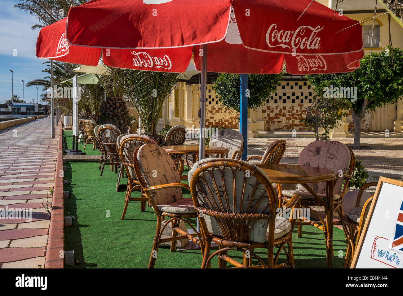 An empty Cafe bar along the promenade with no people at any of the ...