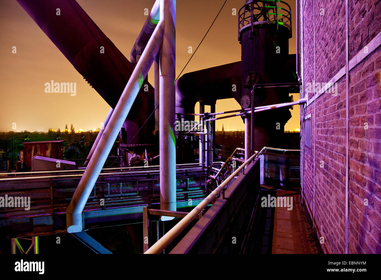 illuminated former steel mill at night, Landschaftspark Duisburg Nord ...