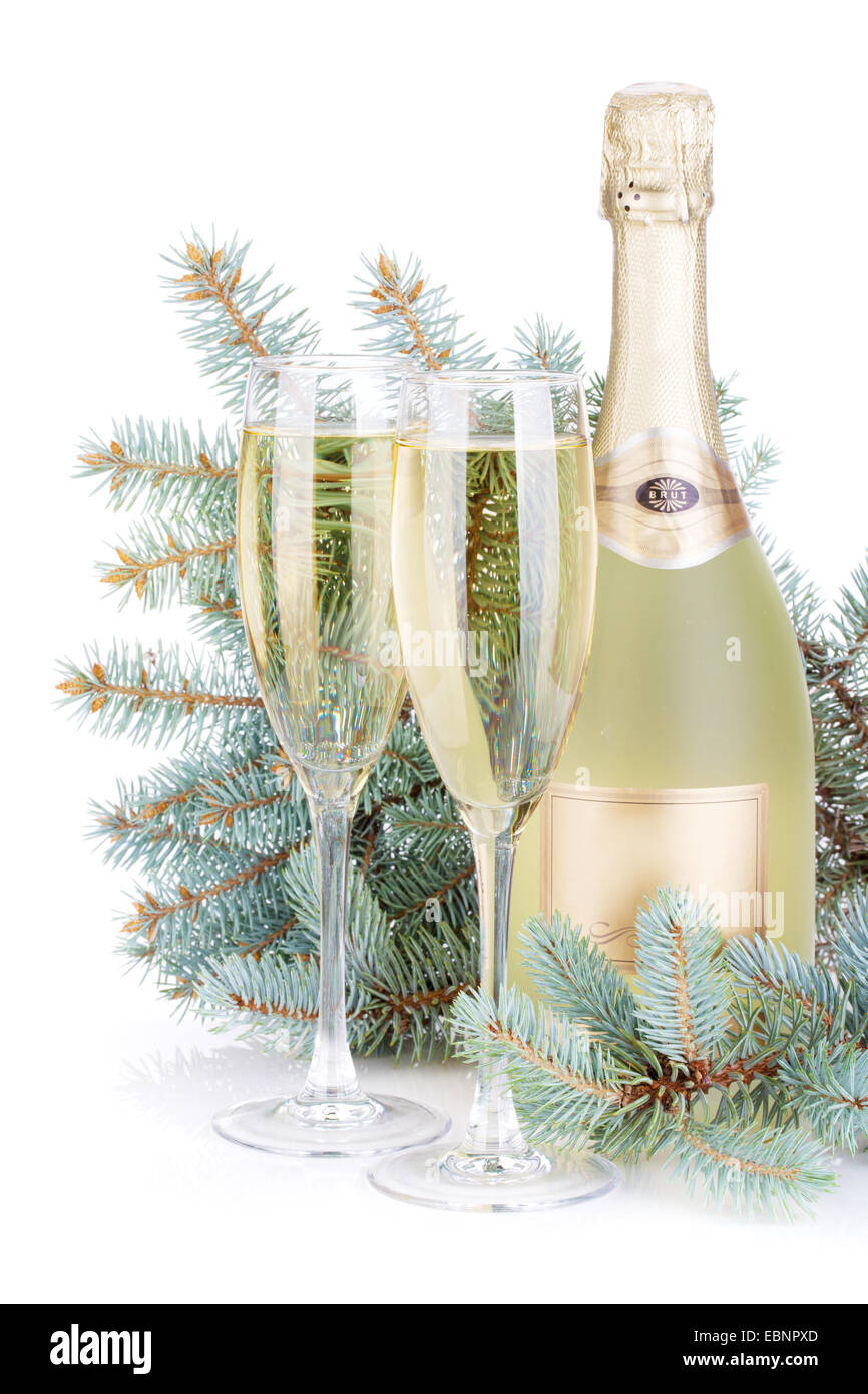 Champagne glasses, bottle and fir tree. Isolated on white background ...
