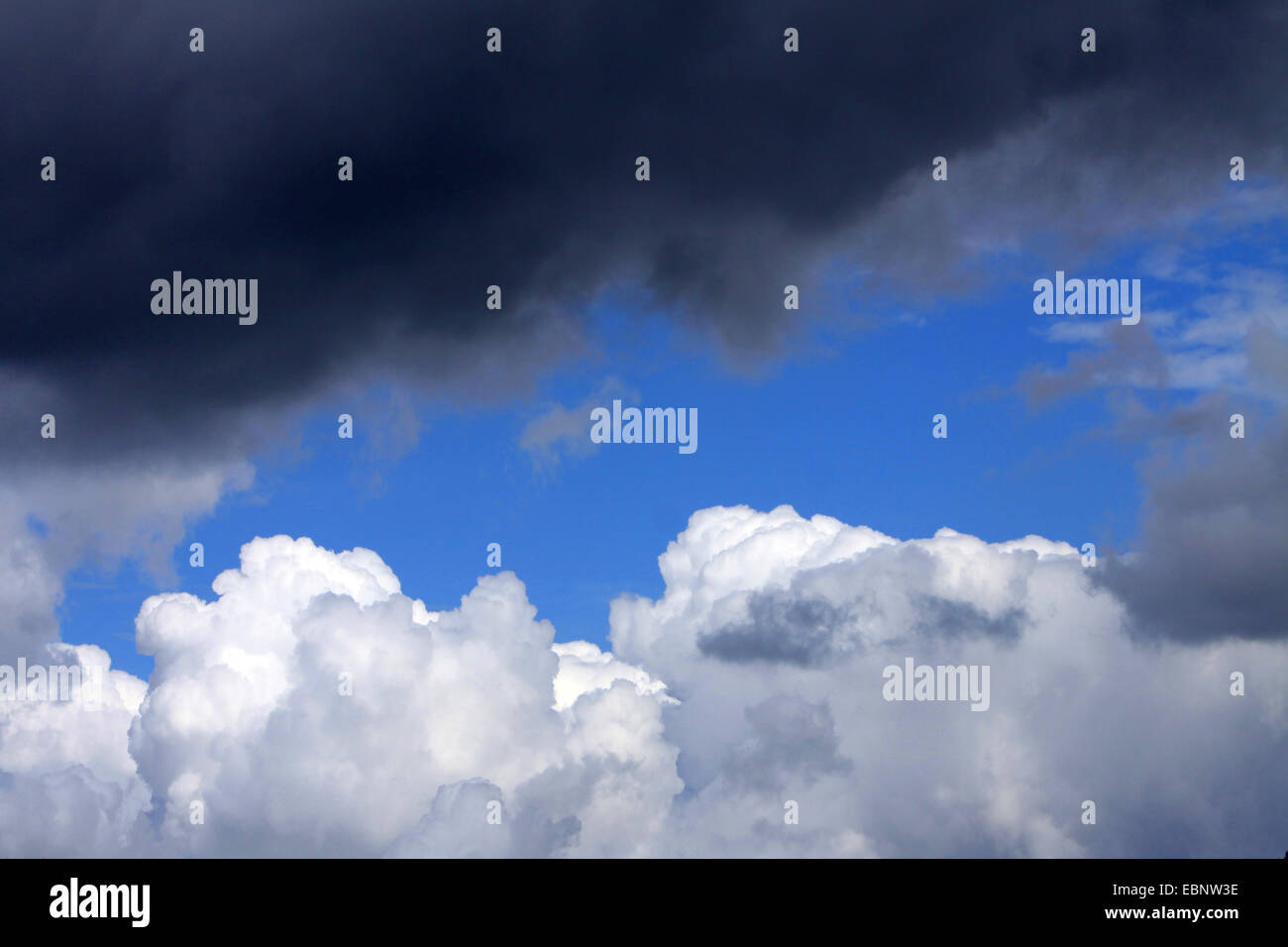 rain clouds and blue sky, Germany Stock Photo - Alamy