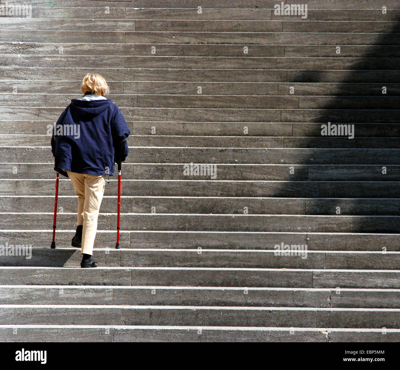 Walking stick disabled rear hi-res stock photography and images - Alamy