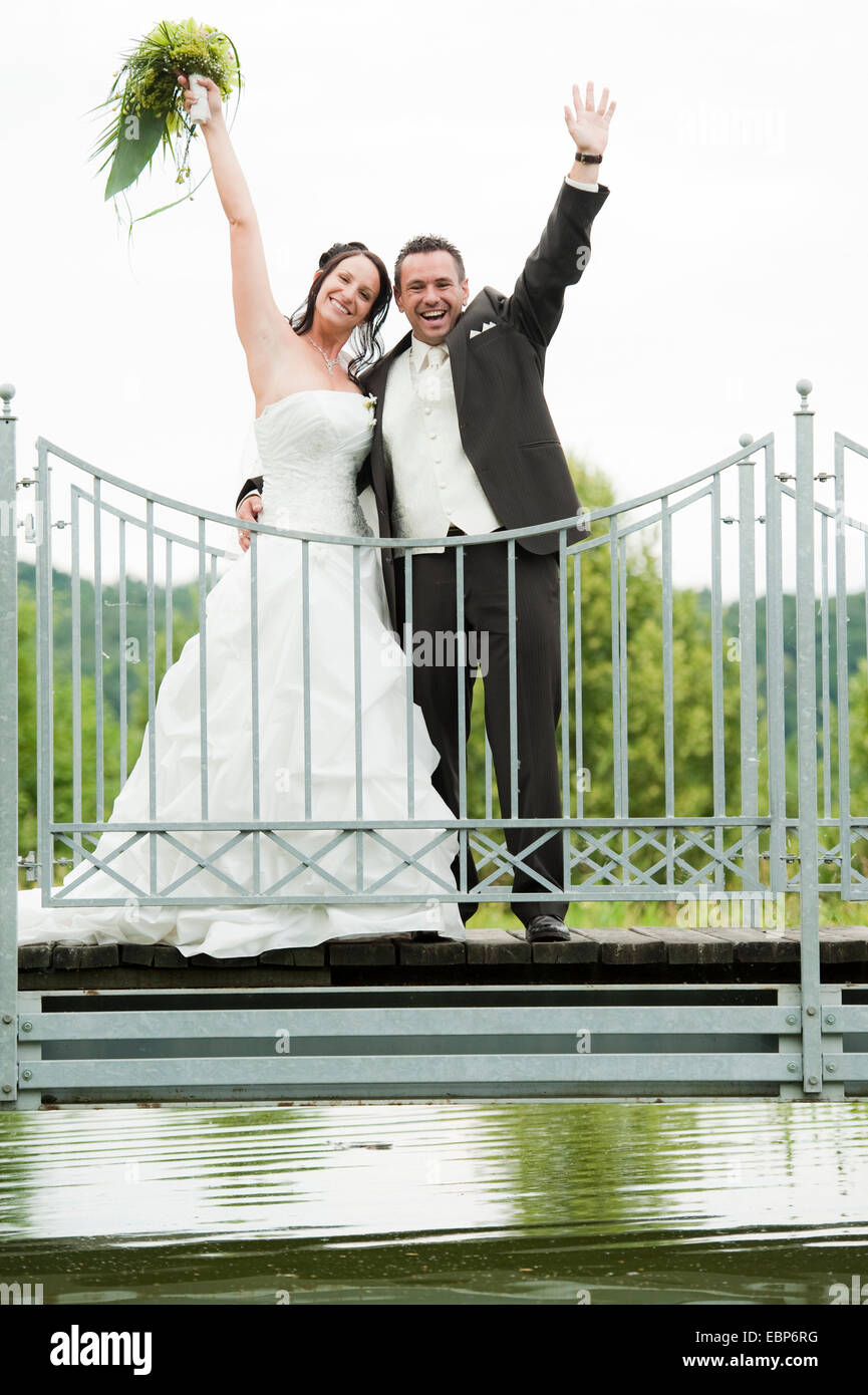 Wedding Couple Posing For Pictures Stock Photos & Wedding Couple Posing ...