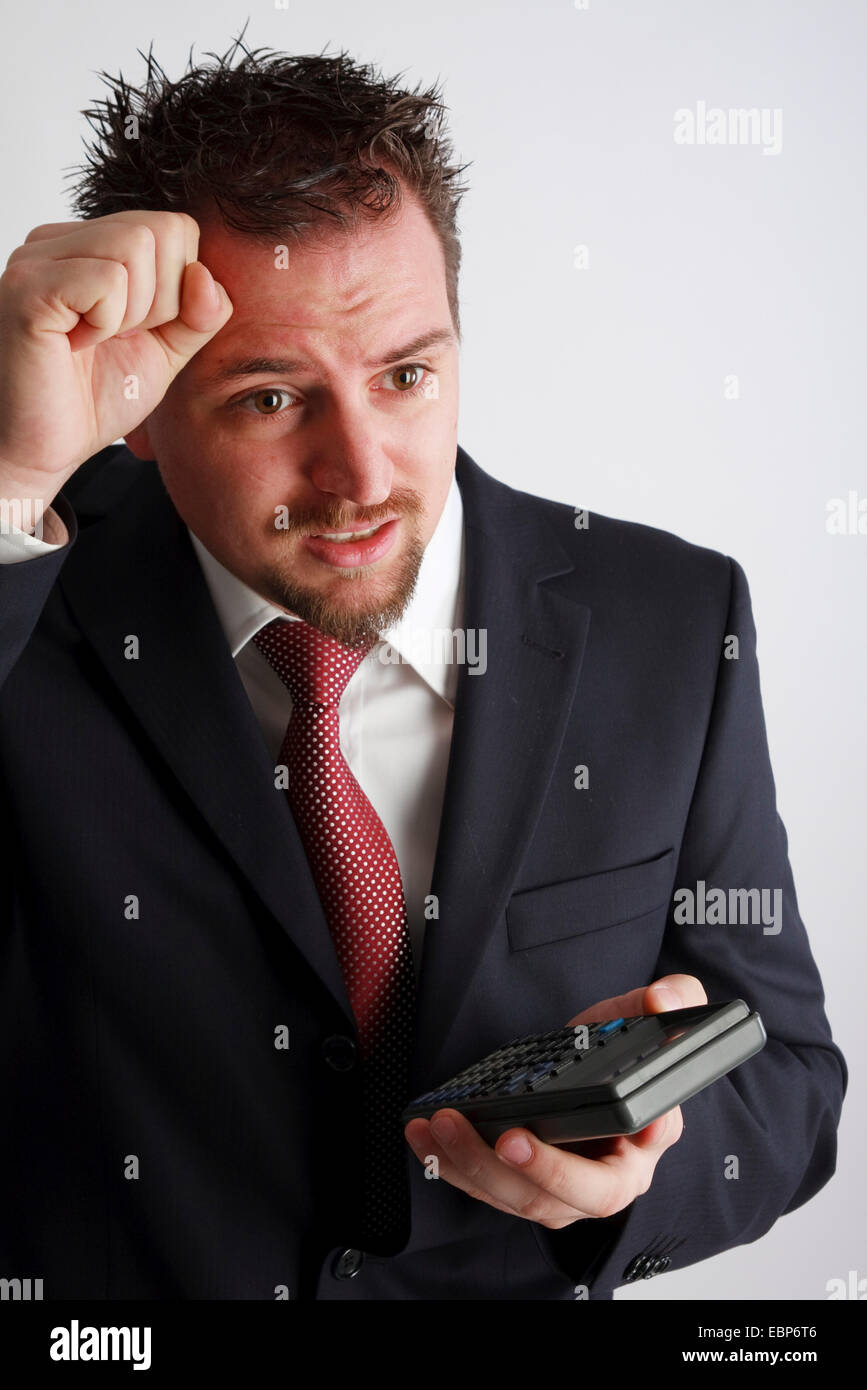 young business man with calculator Stock Photo - Alamy