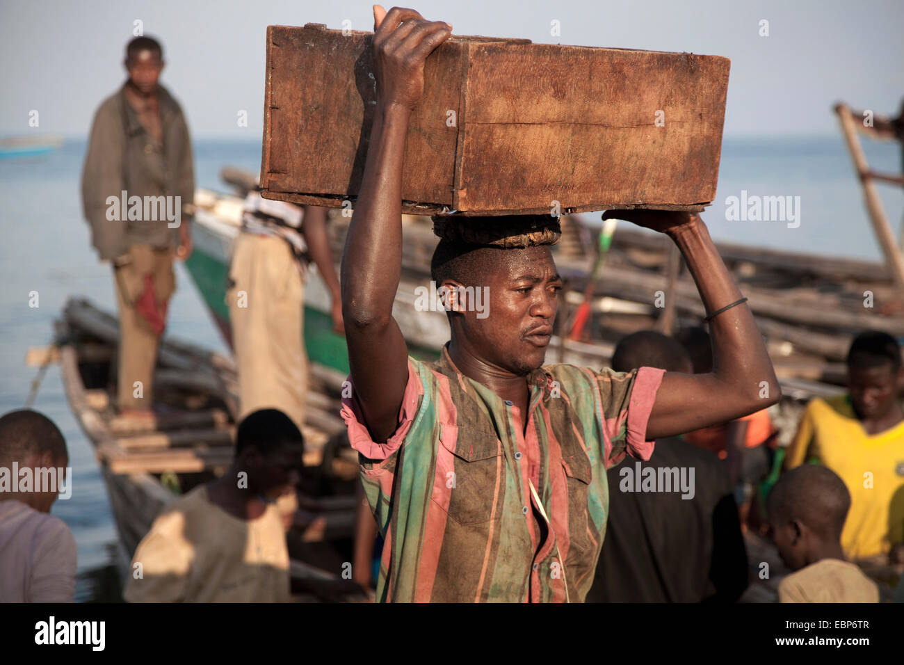 Men Carrying Fish High Resolution Stock Photography and Images - Alamy