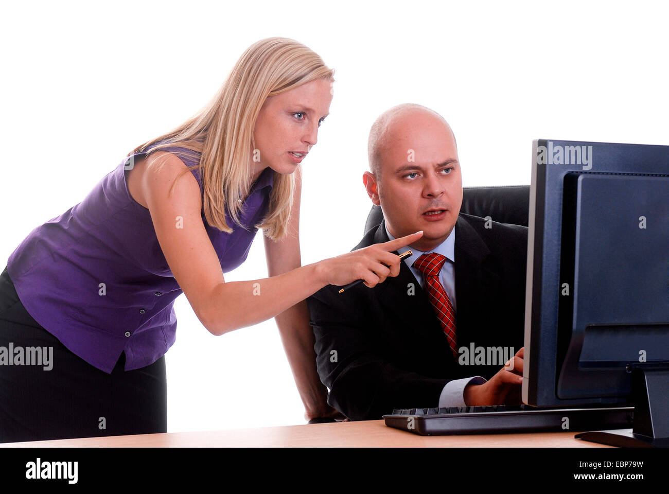 two business people working together on personal computer Stock Photo ...