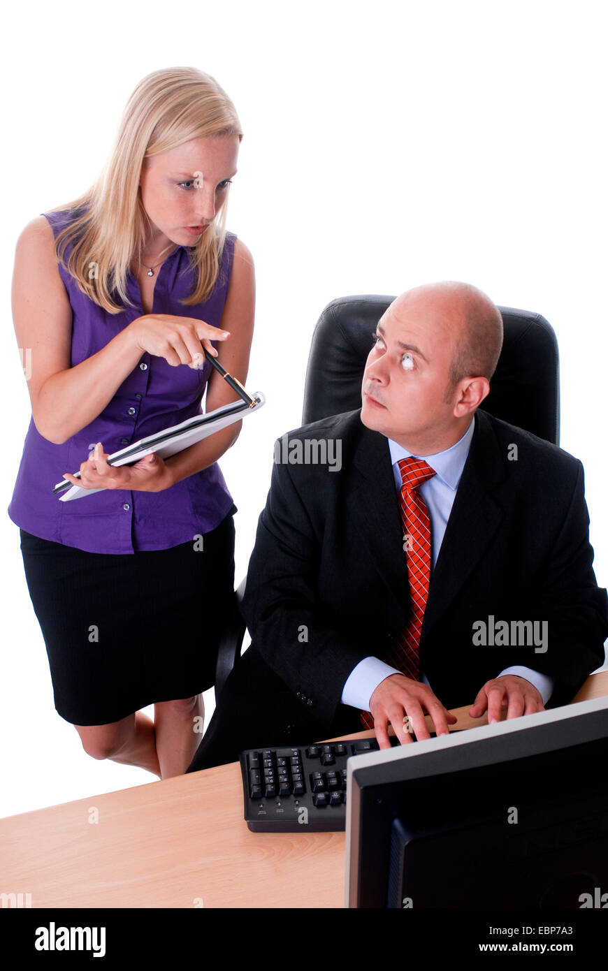 two business people working together on personal computer Stock Photo ...