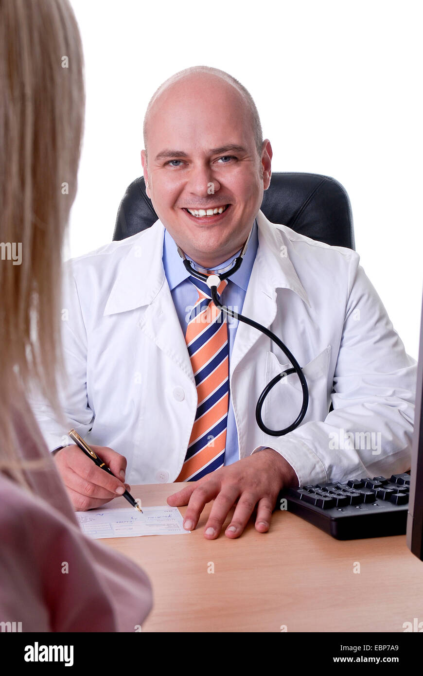 friendly doctor with female patient Stock Photo - Alamy