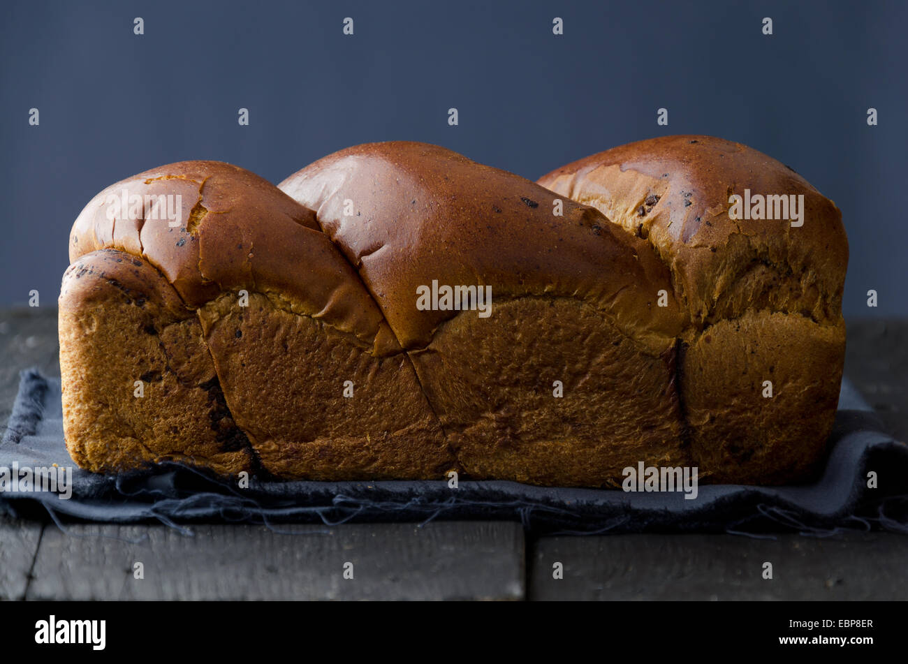 Homemade sponge cake or cake bread over dark wooden table Stock Photo ...