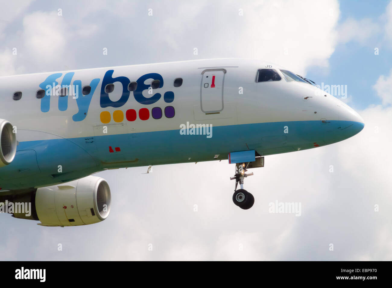 Flybe Embraer 175 landing to Manchester International Airport Stock ...