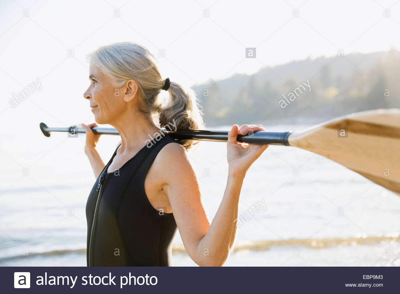 Holding paddle hi-res stock photography and images - Alamy
