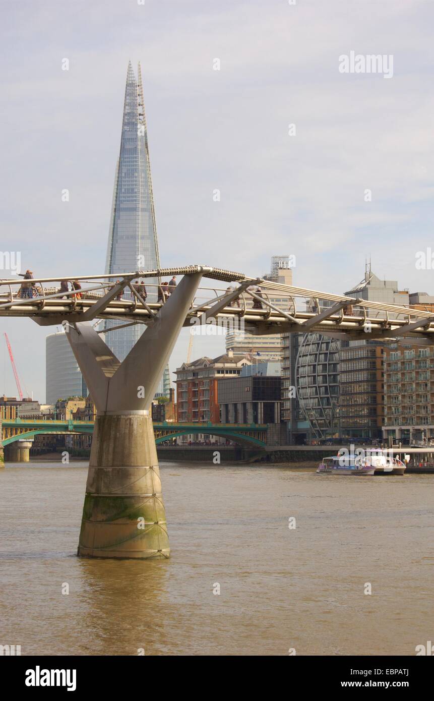 View of the Shard and Millennium Bridge from the North Bank in London ...