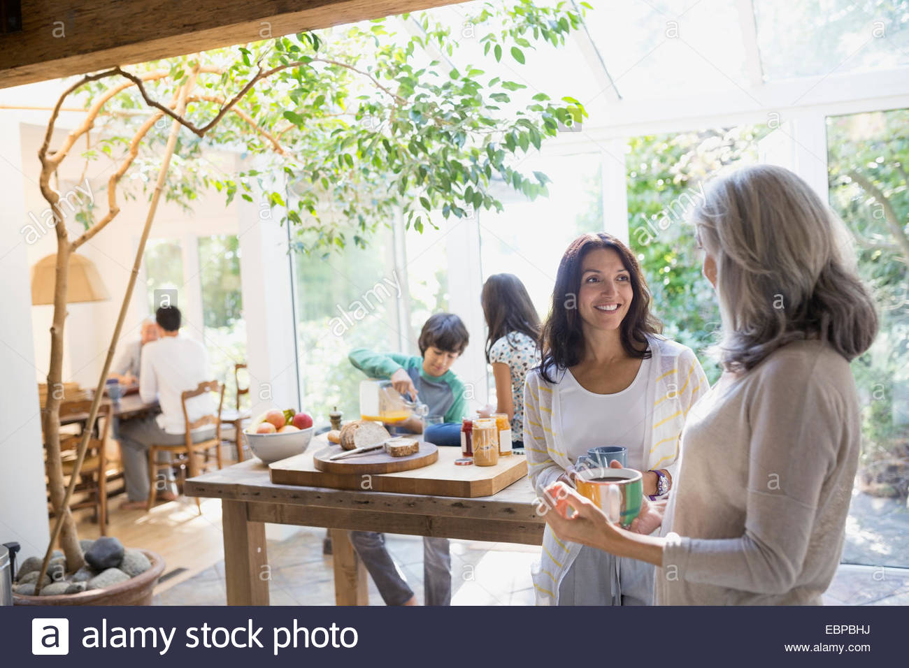 Child mother grandmother talking hi-res stock photography and images ...