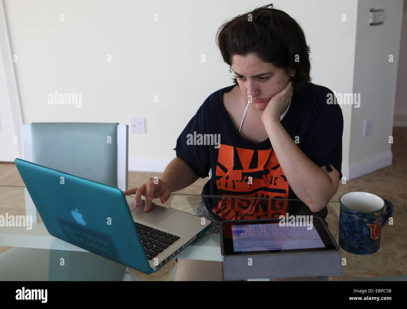 Victoria More doing homework for a Master's Degree Stock Photo - Alamy