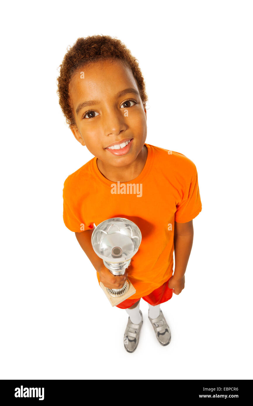 Happy black boy with prize cup Stock Photo - Alamy
