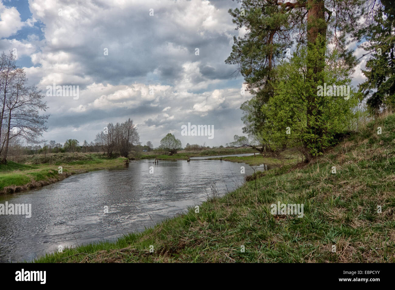 two small rivers merge in one Stock Photo - Alamy