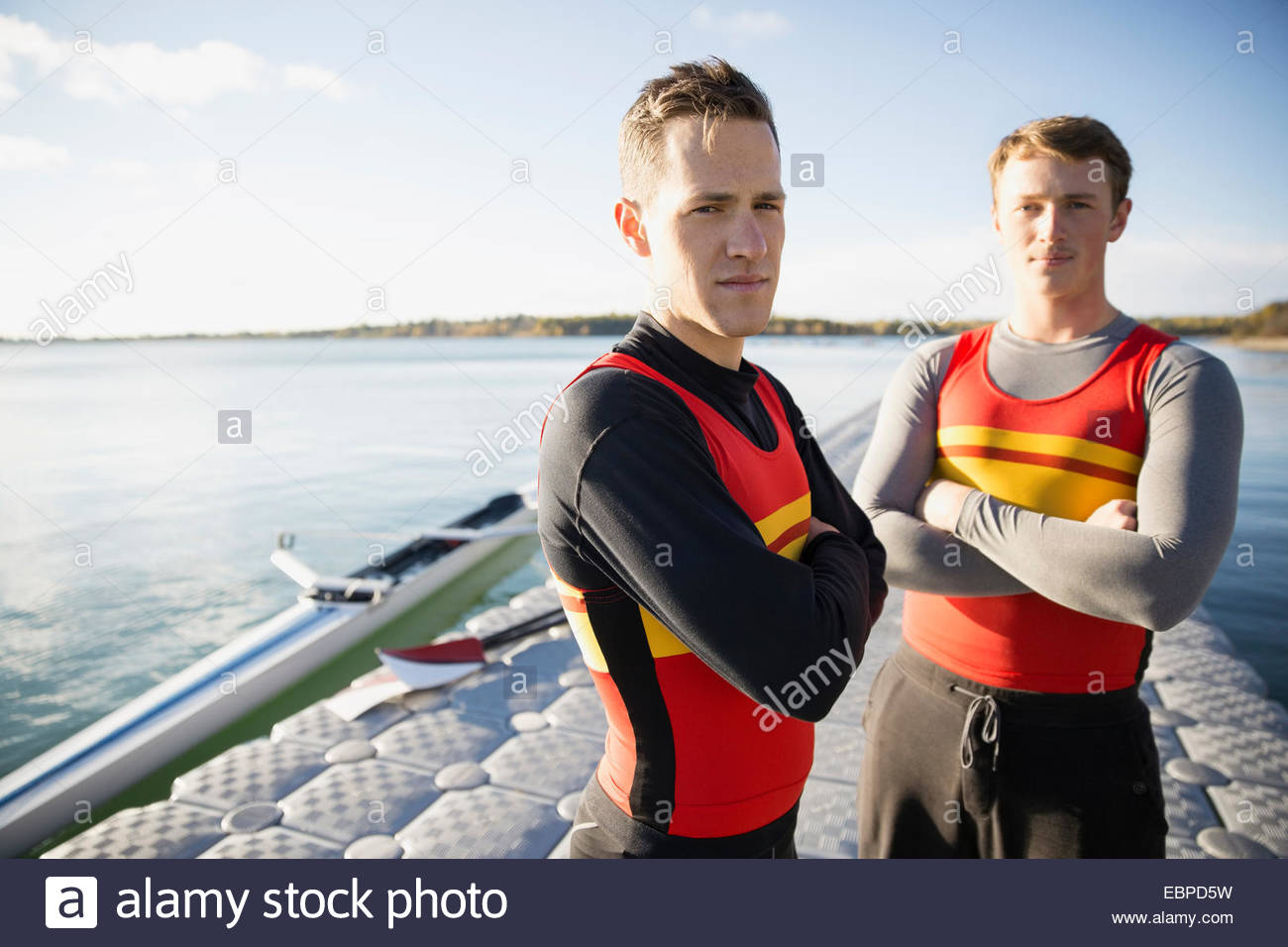 Two men standing up rowing boat hi-res stock photography and images - Alamy