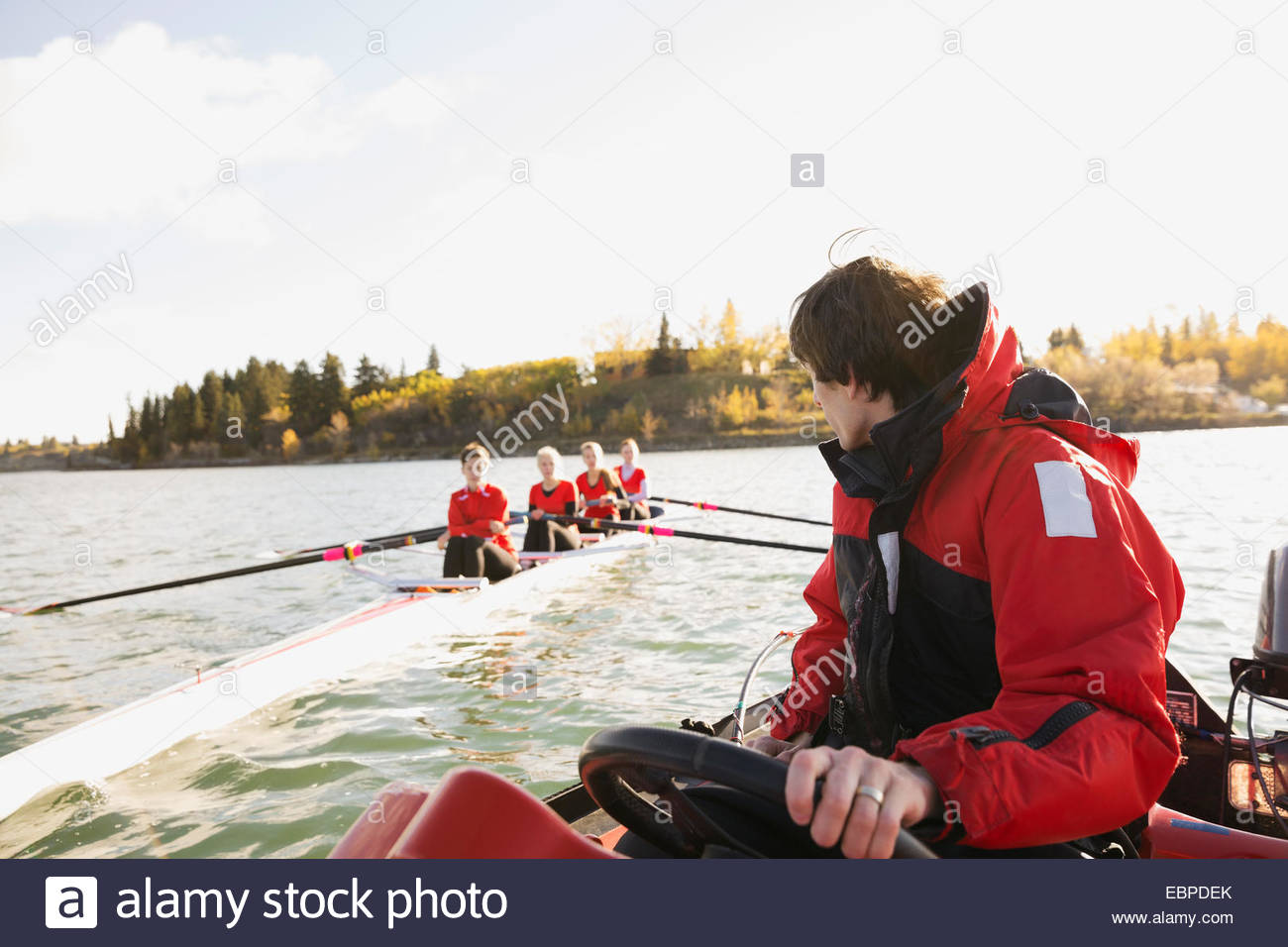 Team rowing on water hi-res stock photography and images - Alamy