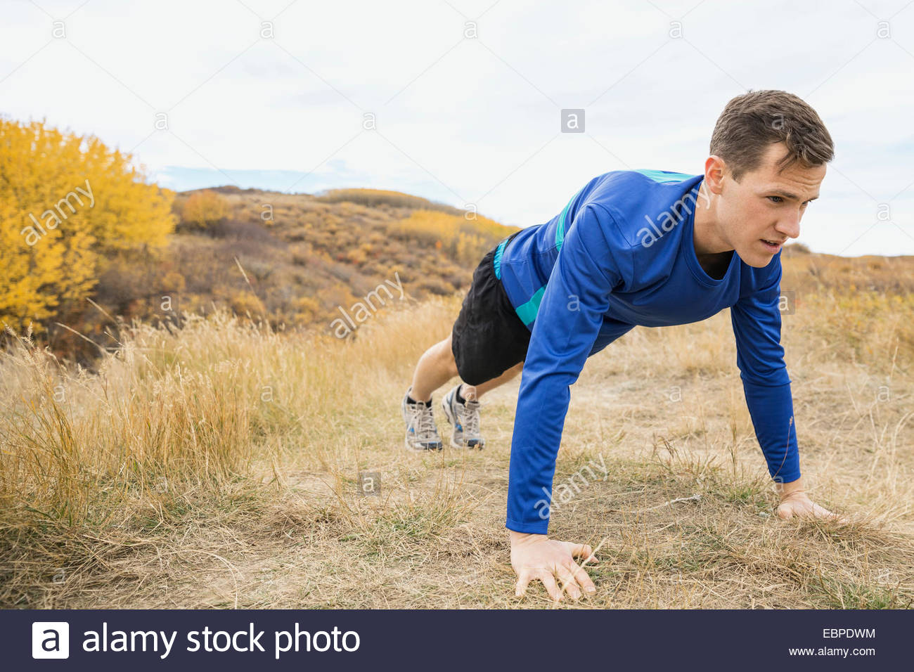 Man doing push-ups Stock Photo - Alamy