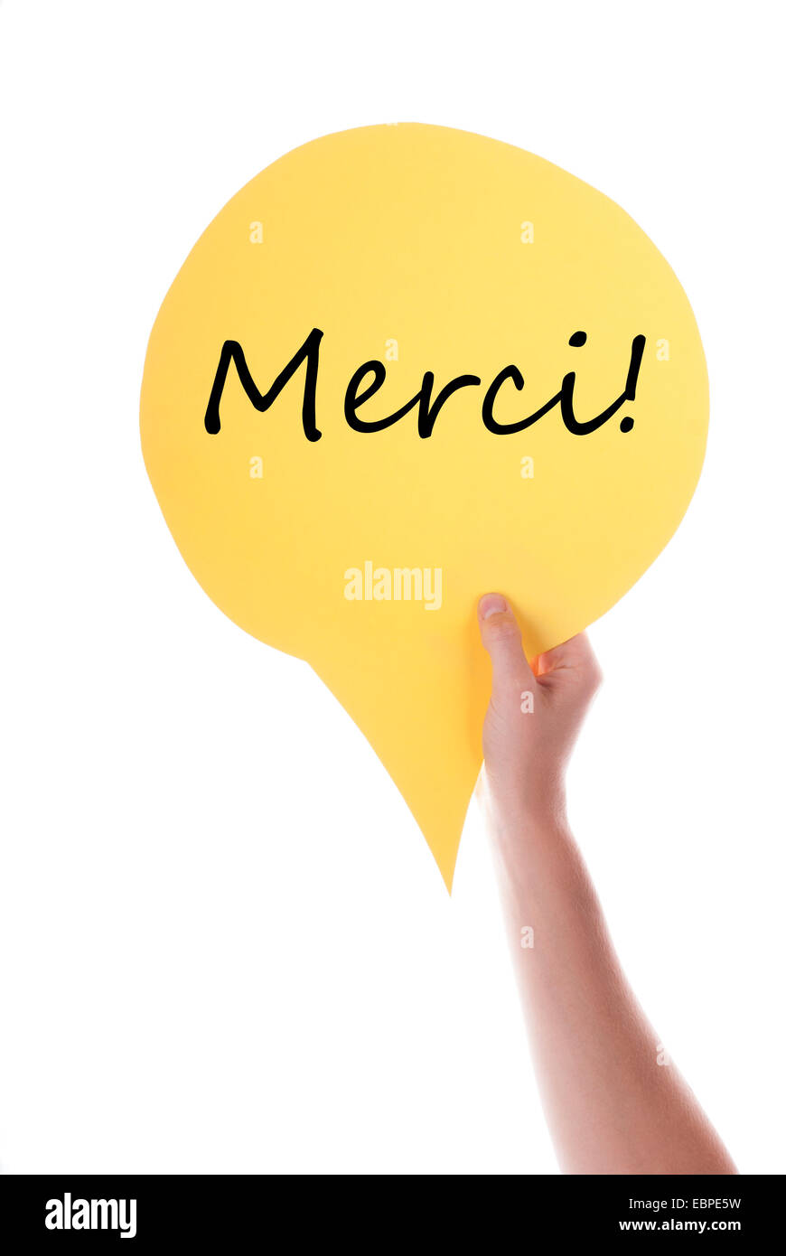 Hand Holding A Yellow Speech Balloon Or Speech Bubble With French Merci ...