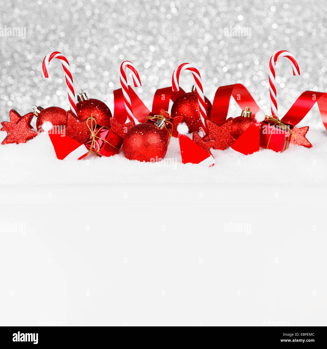 Beautiful red christmas decor on snow Stock Photo - Alamy