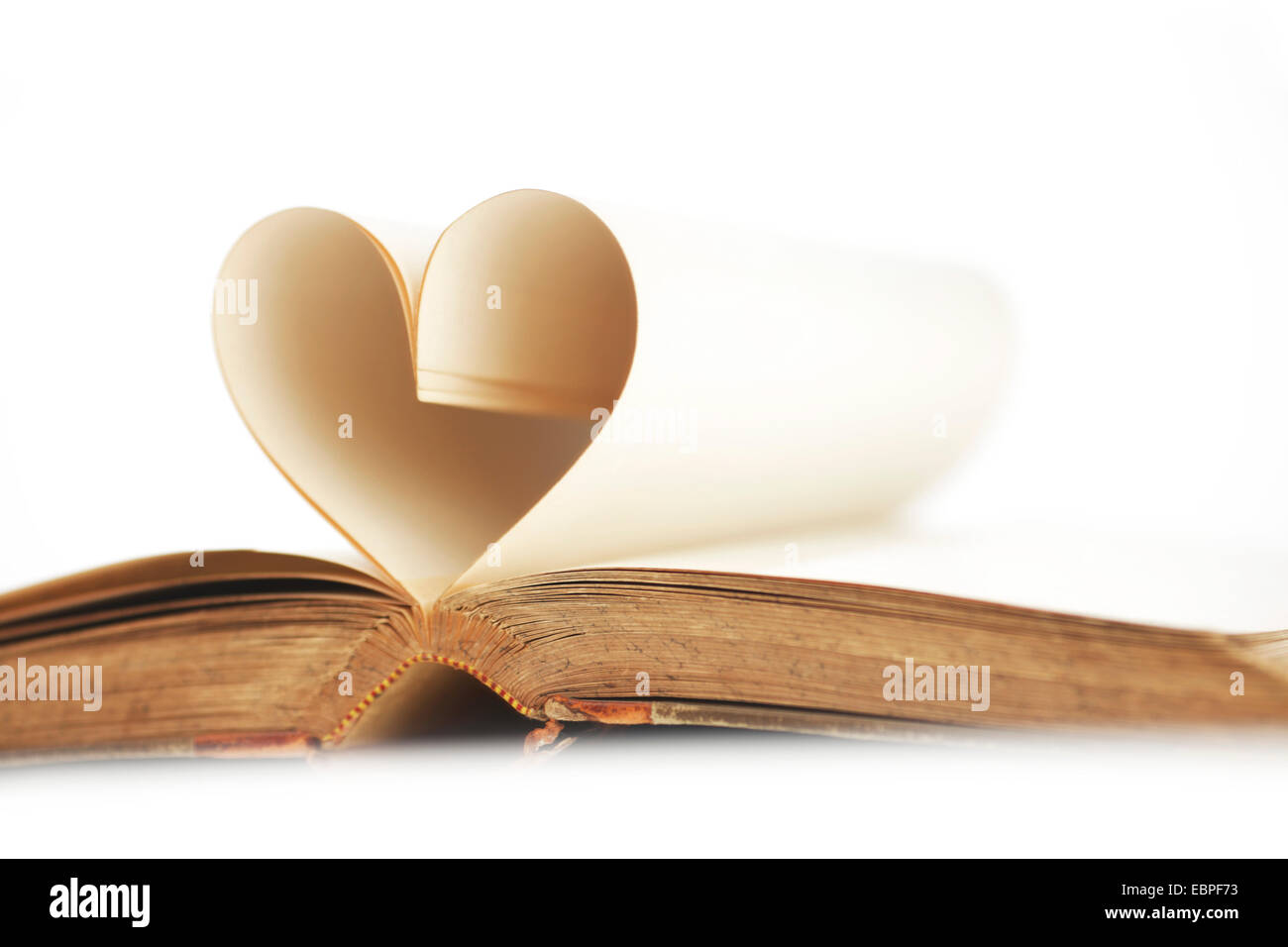 Heart shape made from book pages hi-res stock photography and images ...
