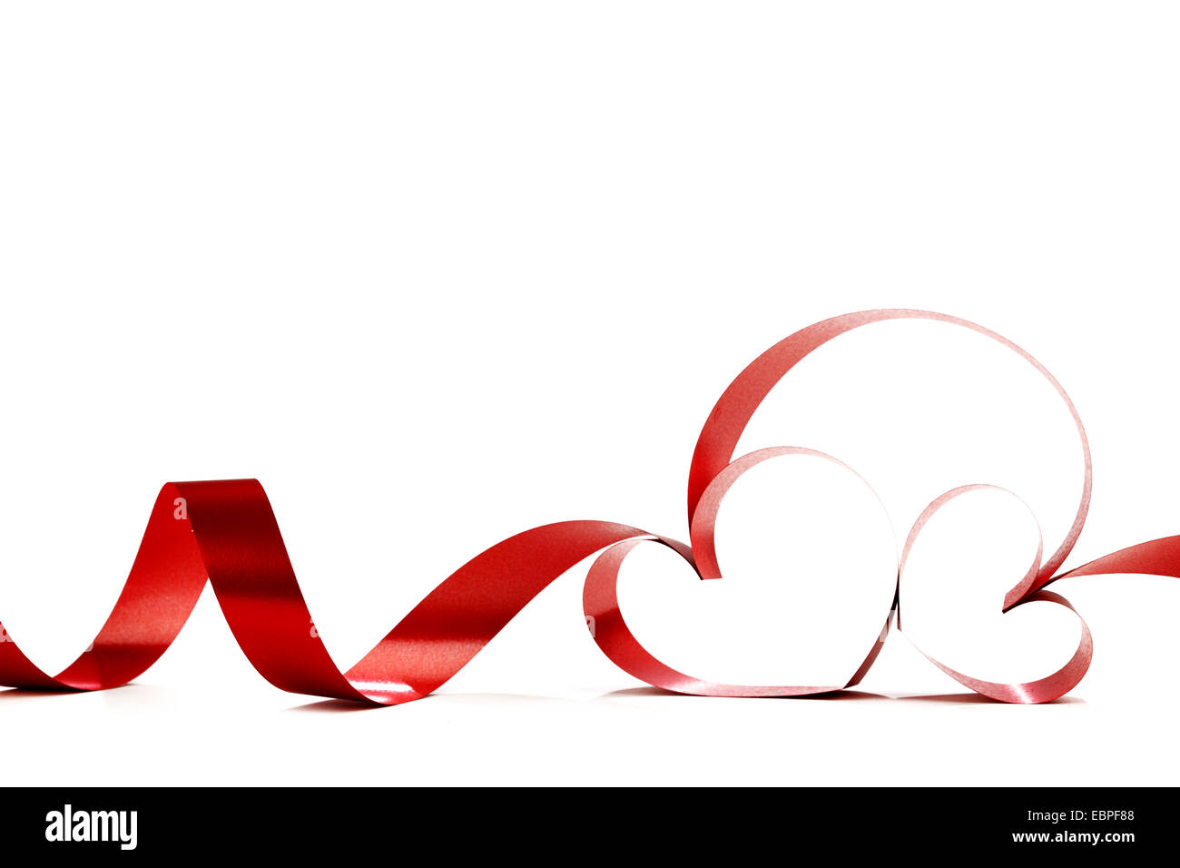 Heart shaped red ribbon isolated on white background Stock Photo - Alamy