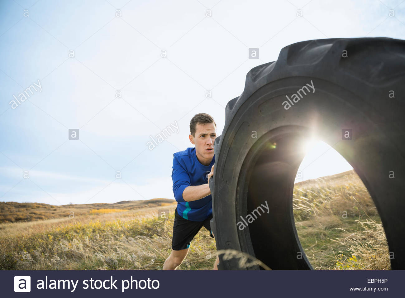Man pushing hi-res stock photography and images - Alamy